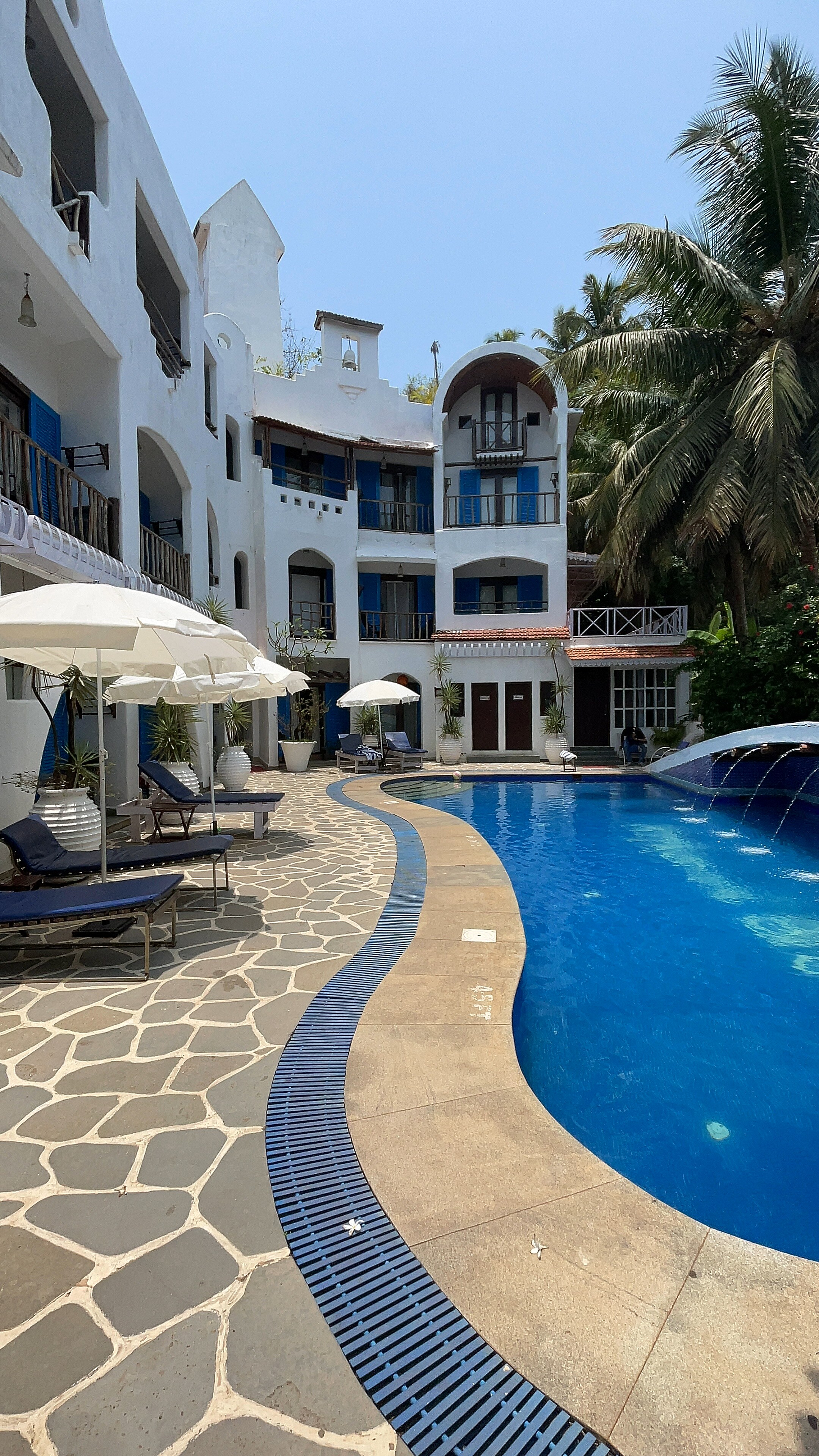 Mykonos Blu 𝗕𝗢𝗢𝗞 Goa Resort 𝘄𝗶𝘁𝗵 𝗙𝗥𝗘𝗘 𝗖𝗮𝗻𝗰𝗲𝗹𝗹𝗮𝘁𝗶𝗼𝗻