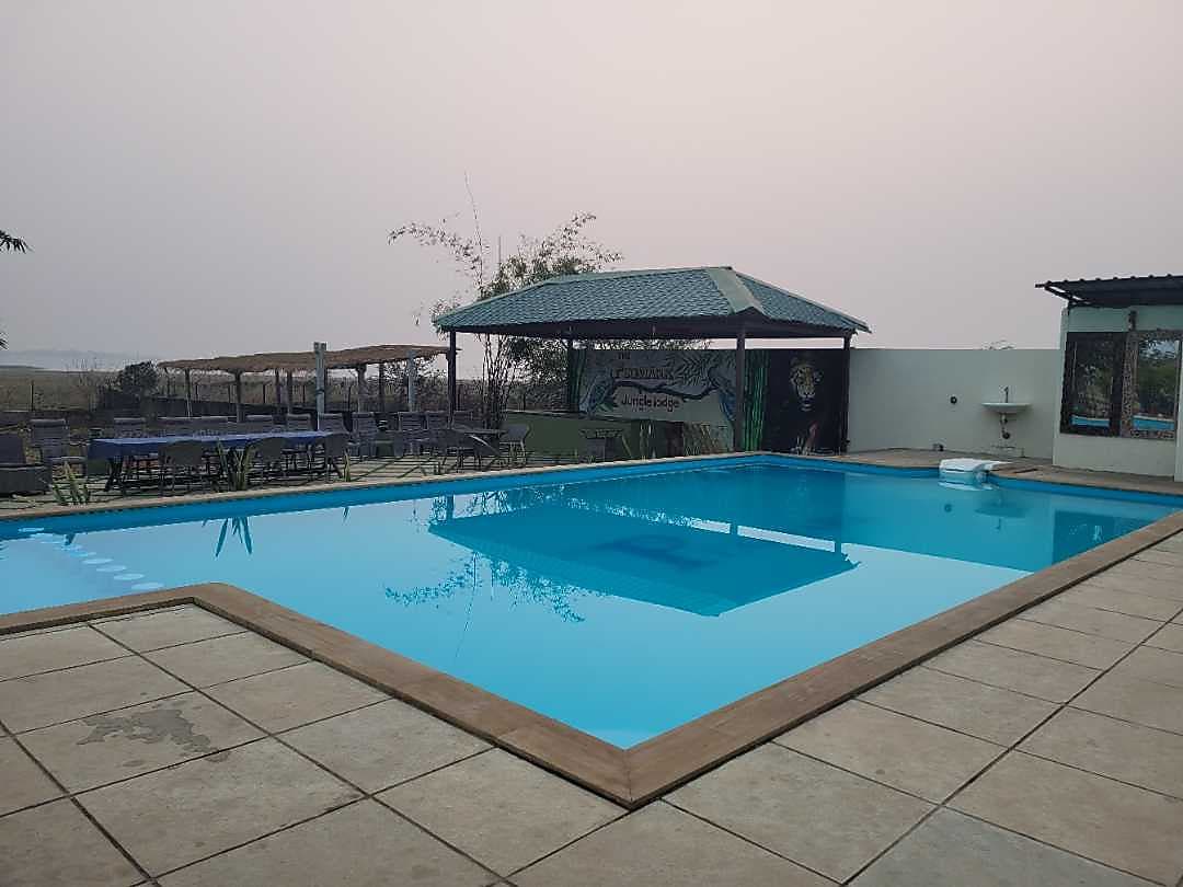 The Pugmark Jungle Lodge 𝗕𝗢𝗢𝗞 Moharli Hotel 𝘄𝗶𝘁𝗵 𝗙𝗥𝗘𝗘 𝗖𝗮𝗻𝗰𝗲𝗹𝗹𝗮𝘁𝗶𝗼𝗻