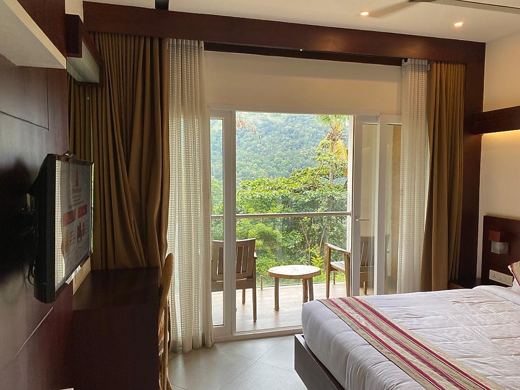 Trivers Resort Munnar 𝗕𝗢𝗢𝗞 Munnar Resort 𝘄𝗶𝘁𝗵 𝗙𝗥𝗘𝗘 𝗖𝗮𝗻𝗰𝗲𝗹𝗹𝗮𝘁𝗶𝗼𝗻