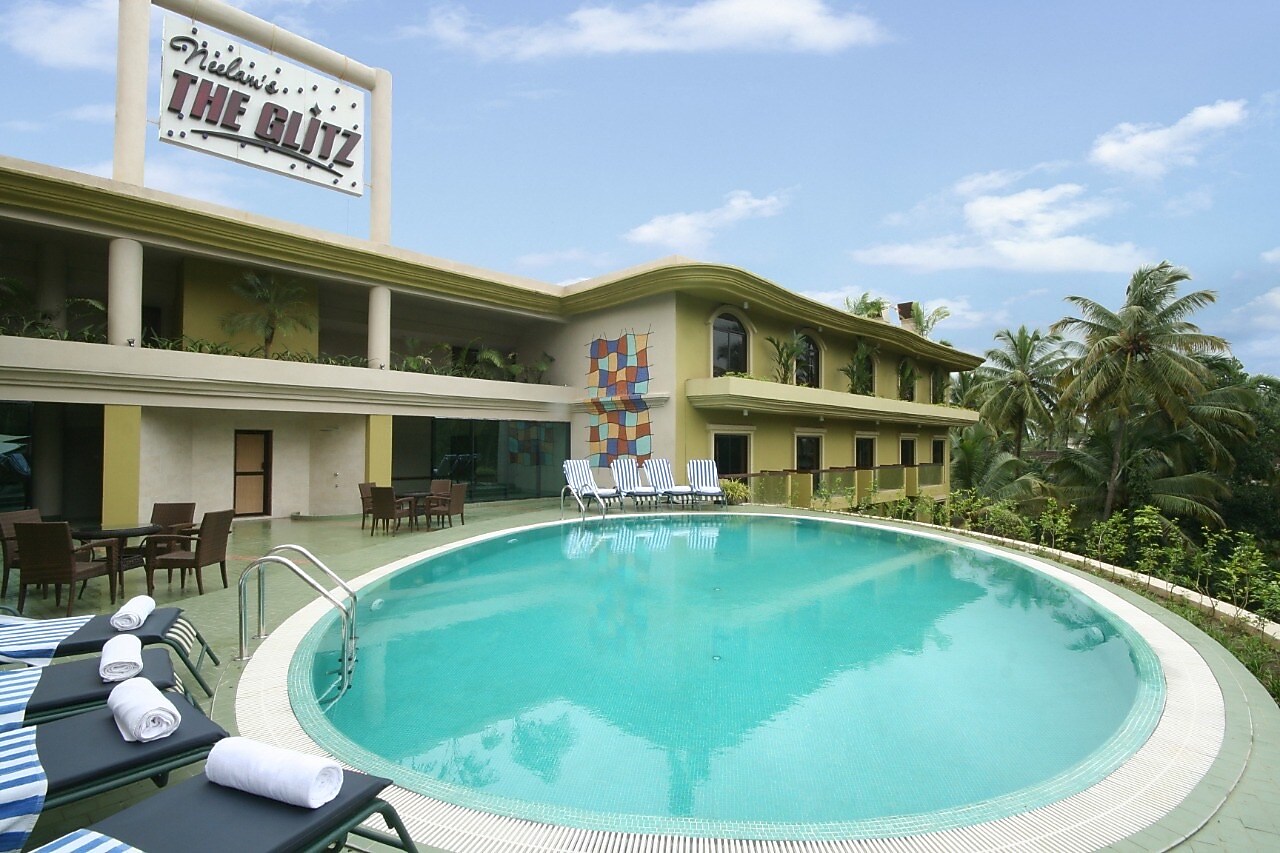 Neelam the Glitz 𝗕𝗢𝗢𝗞 Goa Resort 𝘄𝗶𝘁𝗵 𝗙𝗥𝗘𝗘 𝗖𝗮𝗻𝗰𝗲𝗹𝗹𝗮𝘁𝗶𝗼𝗻
