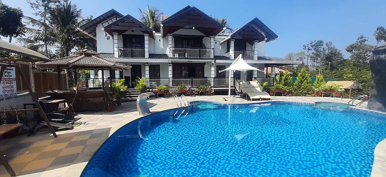 Duplex Pool View Villa Coorg 𝗕𝗢𝗢𝗞 Coorg Homestay 𝘄𝗶𝘁𝗵 𝗙𝗥𝗘𝗘 𝗖𝗮𝗻𝗰𝗲𝗹𝗹𝗮𝘁𝗶𝗼𝗻