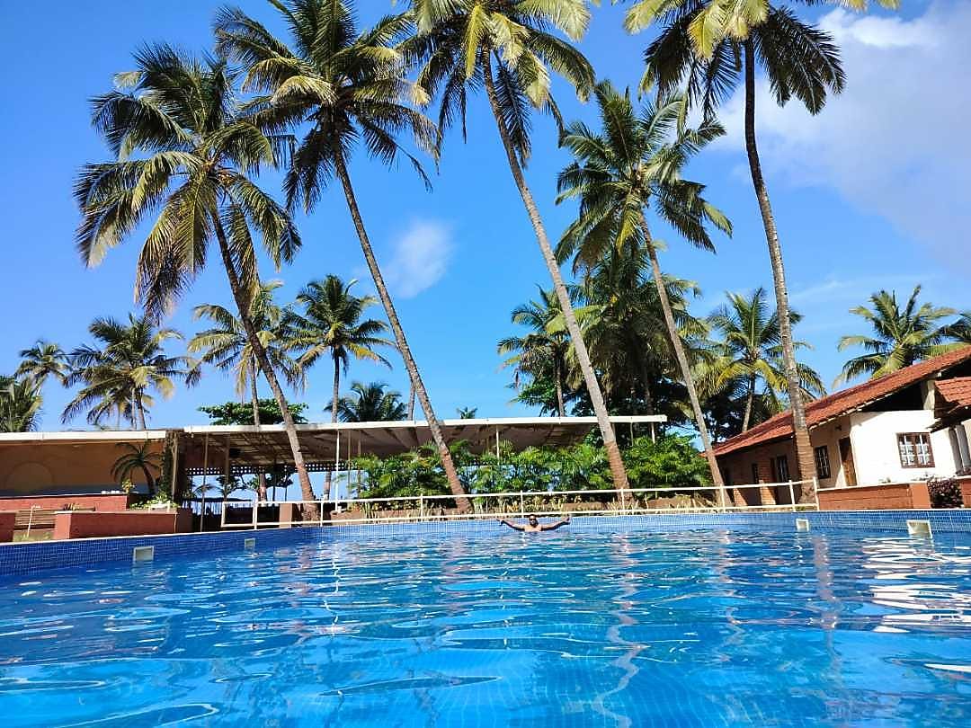 Colmar Beach Resort 𝗕𝗢𝗢𝗞 Goa Resort 𝘄𝗶𝘁𝗵 𝗙𝗥𝗘𝗘 𝗖𝗮𝗻𝗰𝗲𝗹𝗹𝗮𝘁𝗶𝗼𝗻