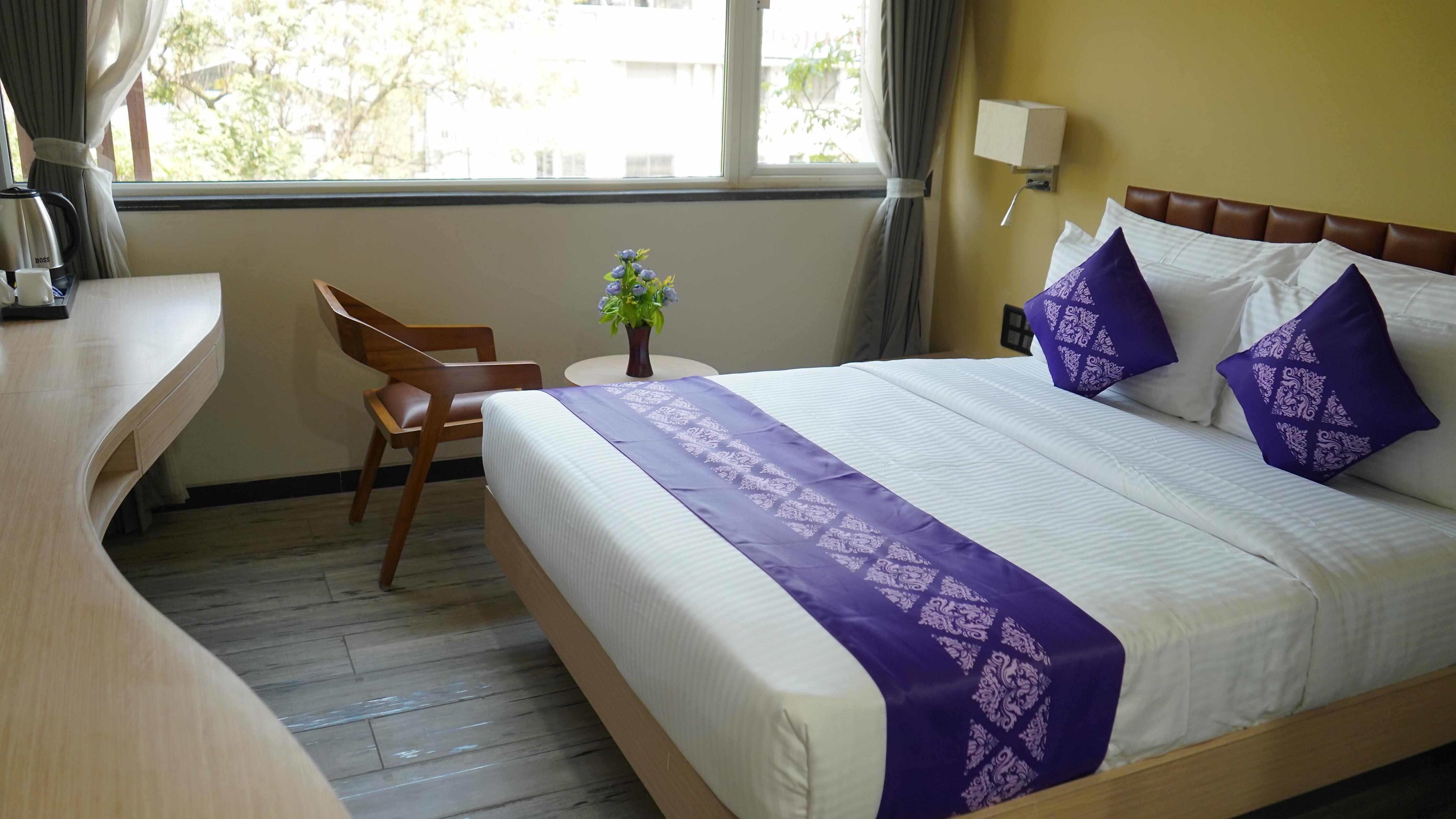 Purple Beds by VITS Dwarkesh, Surat 𝗕𝗢𝗢𝗞 Surat Hotel 𝘄𝗶𝘁𝗵 𝗙𝗥𝗘𝗘 𝗖𝗮𝗻𝗰𝗲𝗹𝗹𝗮𝘁𝗶𝗼𝗻