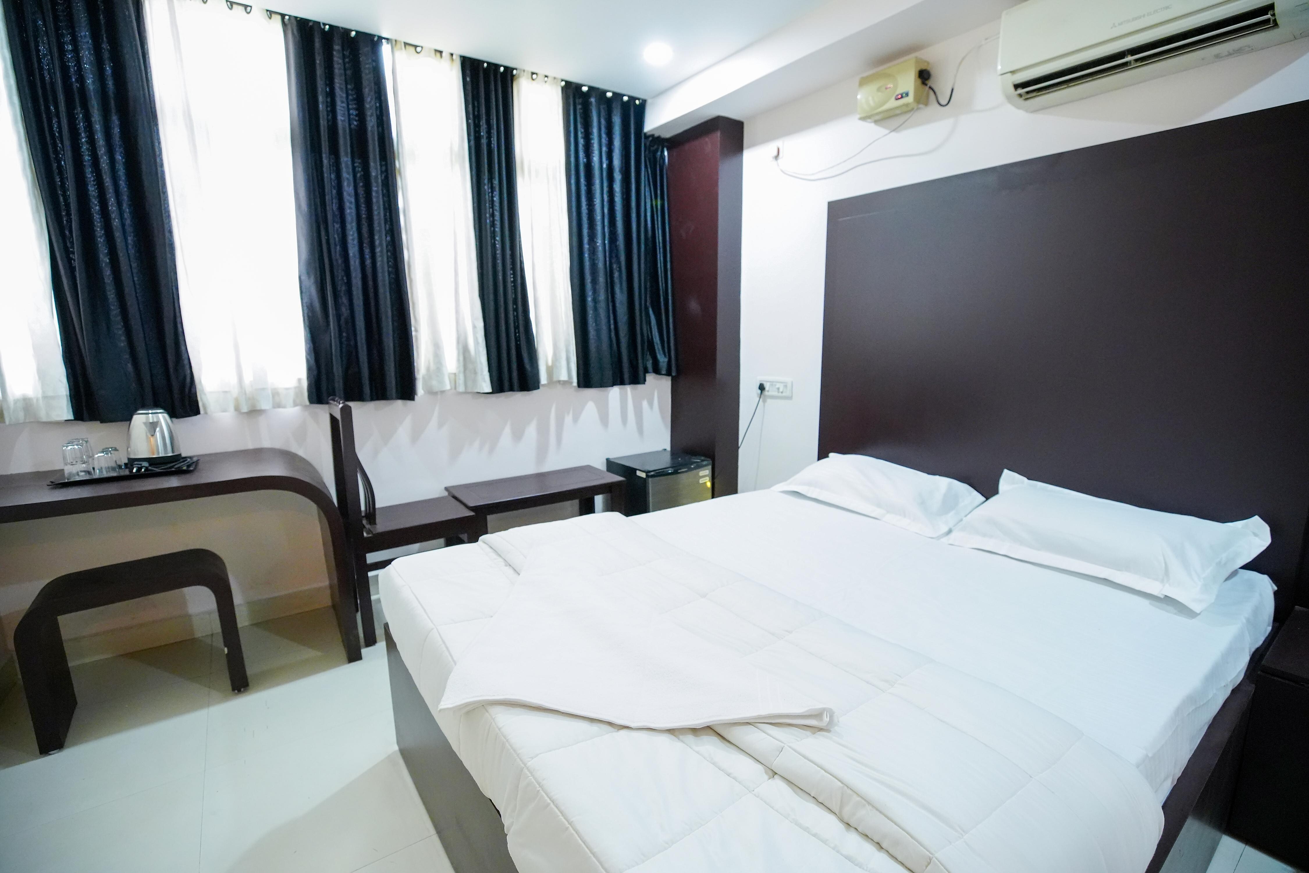 Rooms of Erica Hotel International - Hotel in Perinthalmanna