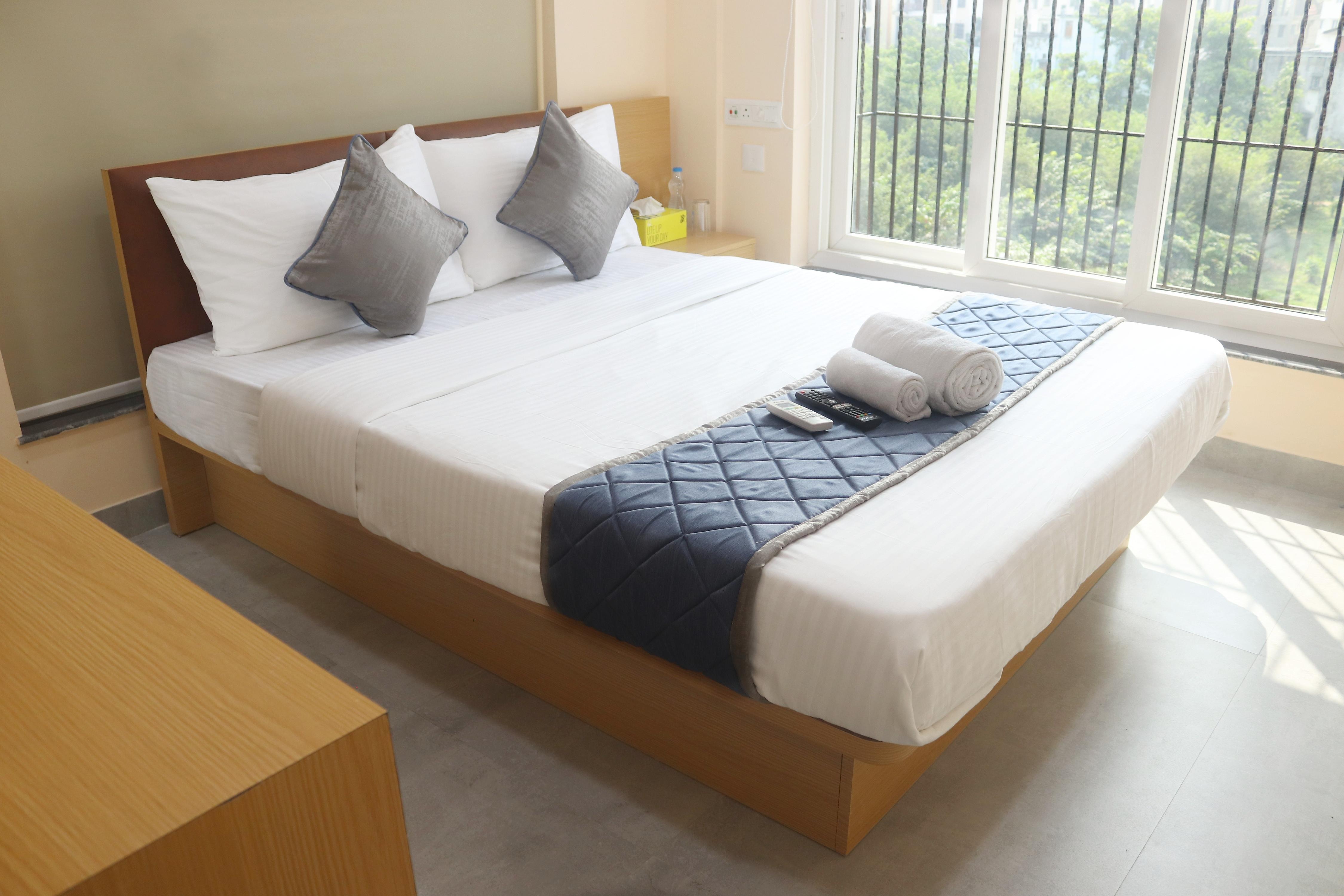 Rooms of Axon Business Stays Newtown - Kolkata Hotel on Goibibo
