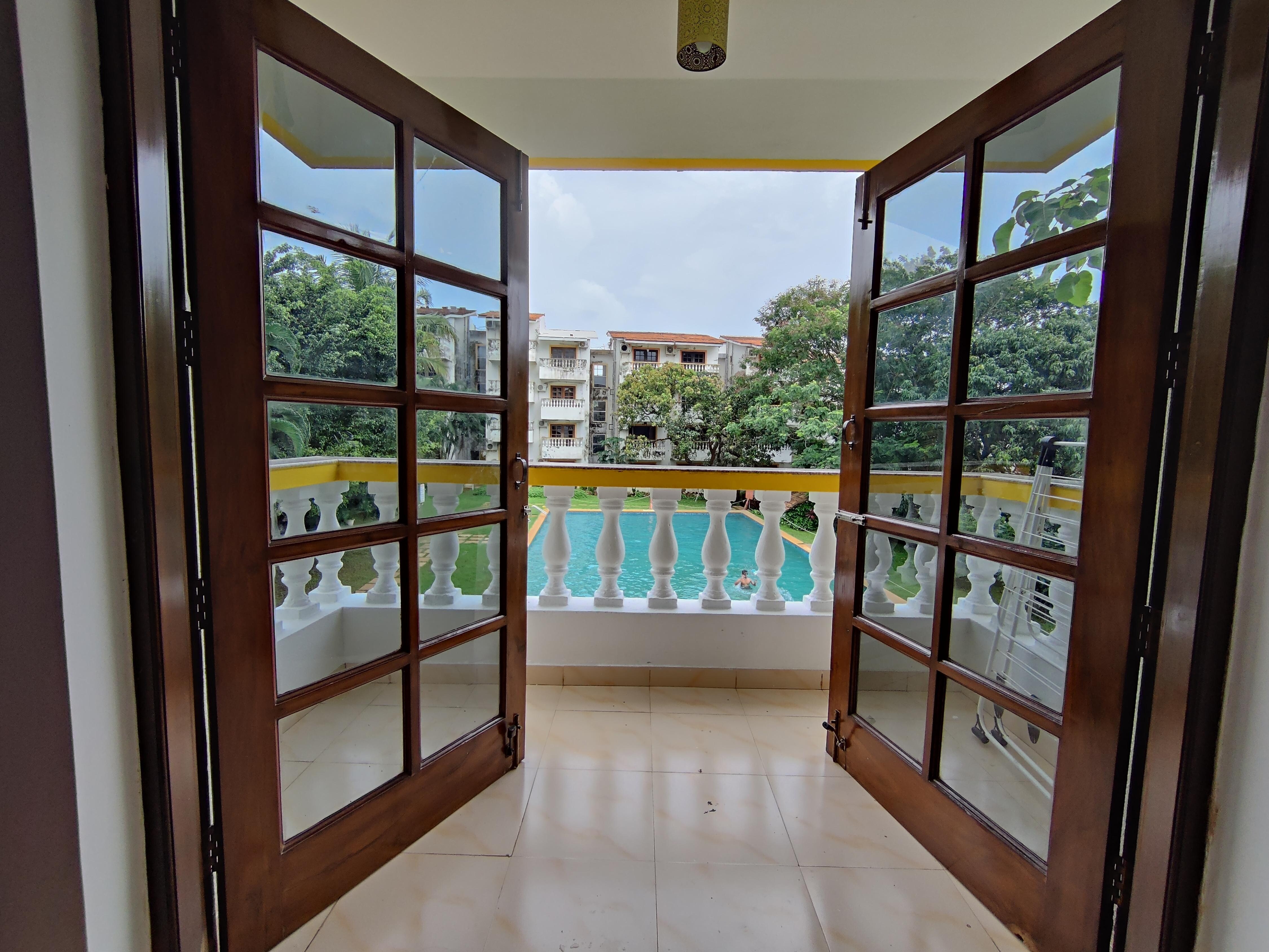 Ashiyana Pool Facing Apartment in North Goa 𝗕𝗢𝗢𝗞 Goa Apartment