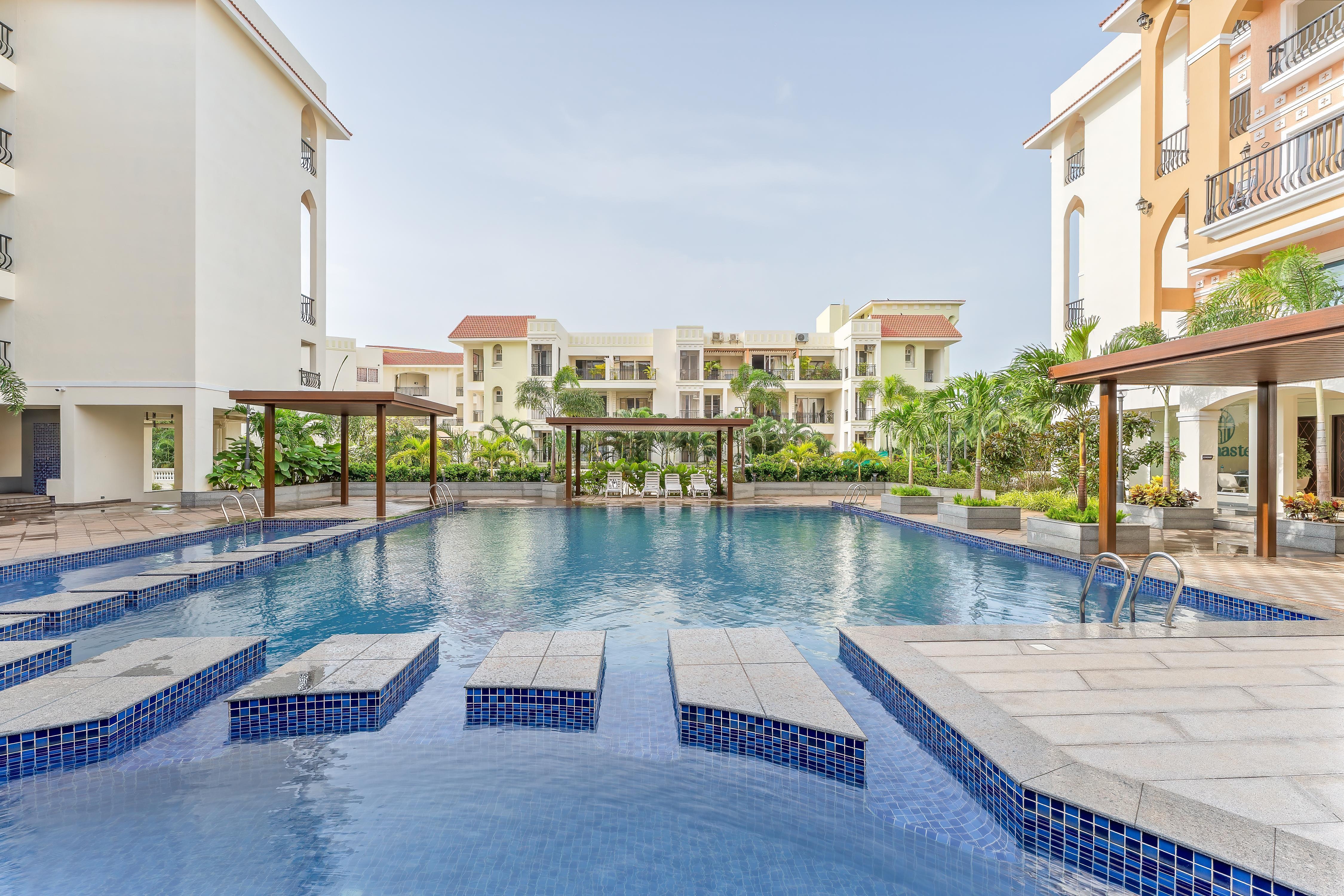 Sereno Azura 1 bhk pool view w / game zone, jacuzzi 𝗕𝗢𝗢𝗞 Goa Apartment